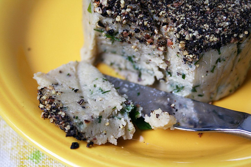 Pepper-crusted cashew cheese with herbs - Planet Thrive